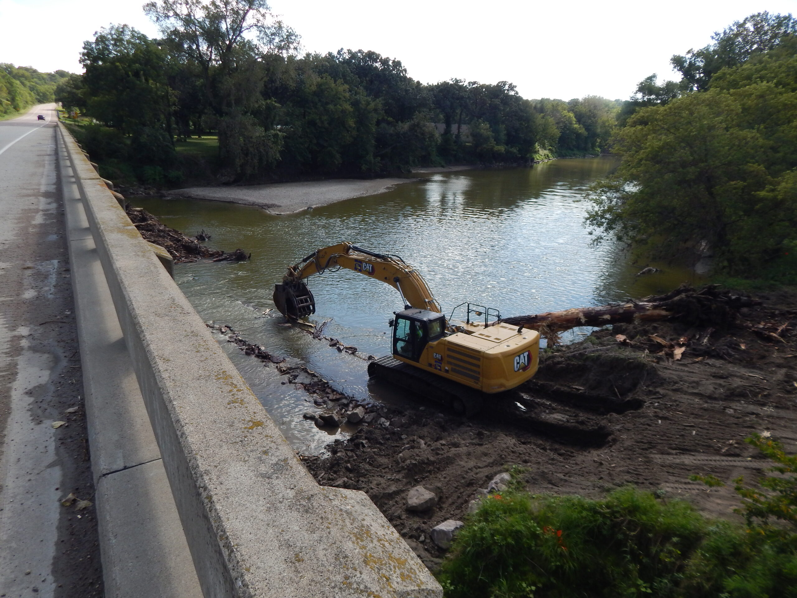 Tree debris removed from under CR 13 bridge | News, Sports, Jobs - The ...
